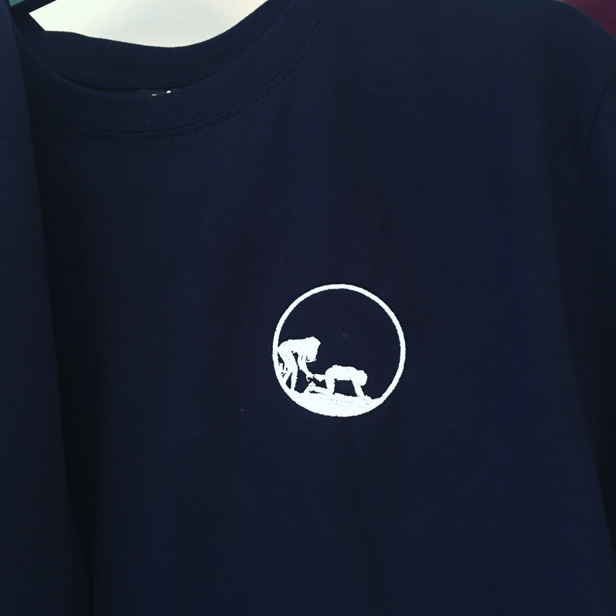 Navy T with white SHAG logo design on chest embroidery. | Roots For Bloom