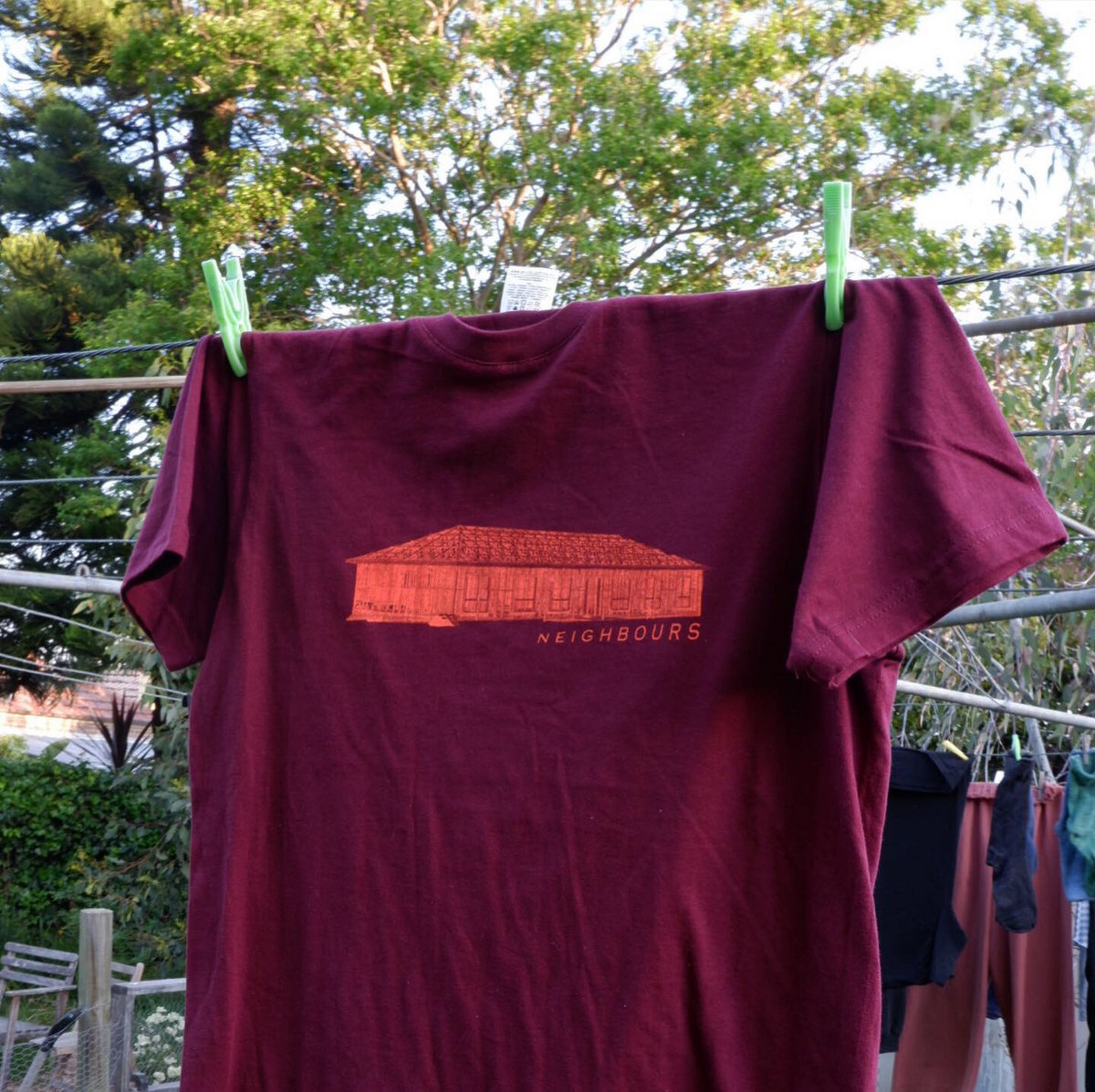 Neighbours Workwear tee in 'School uniform Maroon' | Neighbours