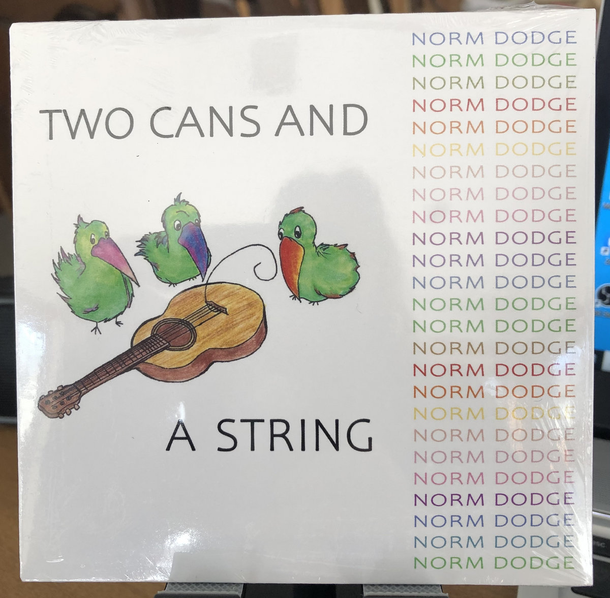 Two Cans and A String | Norm Dodge