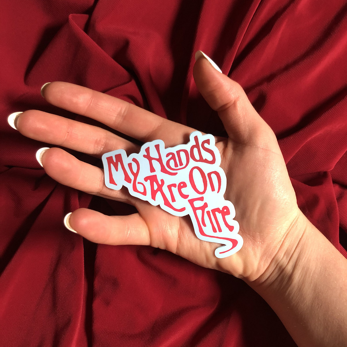 Catching Fire Hand Symbol