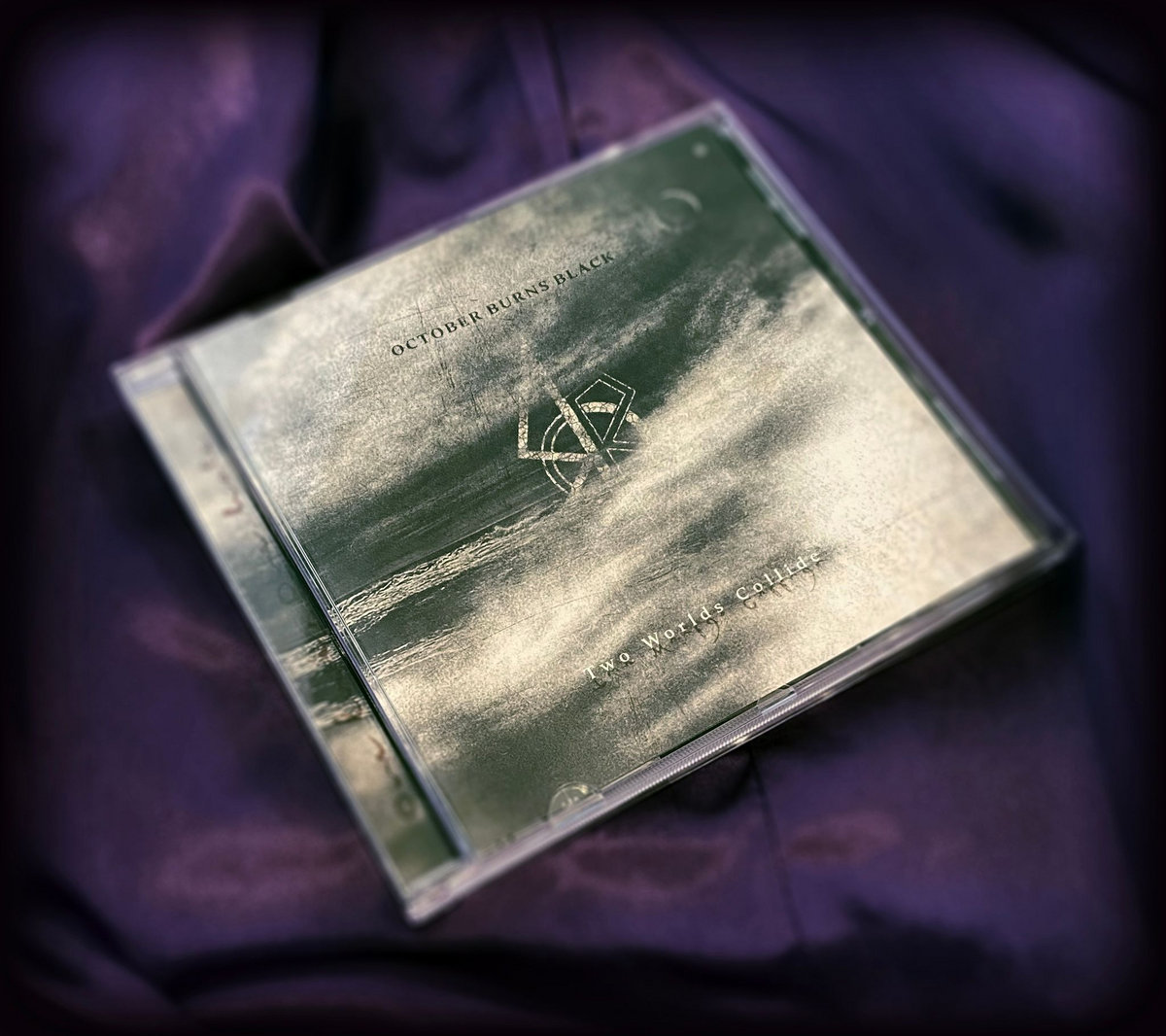 Two Worlds Collide | October Burns Black