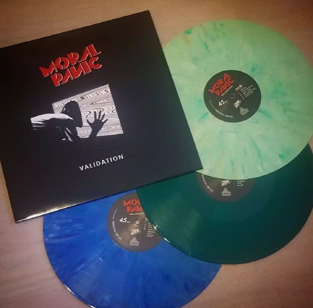 Validation | Moral Panic | Reptilian Records