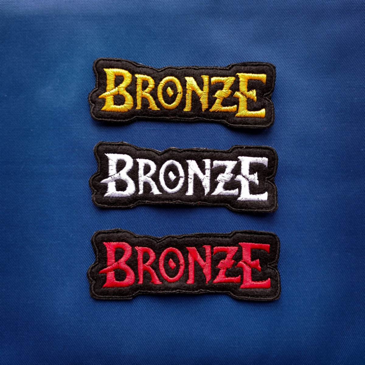 BRONZE - Shape Patch (Gold, White & Red) | Bronze