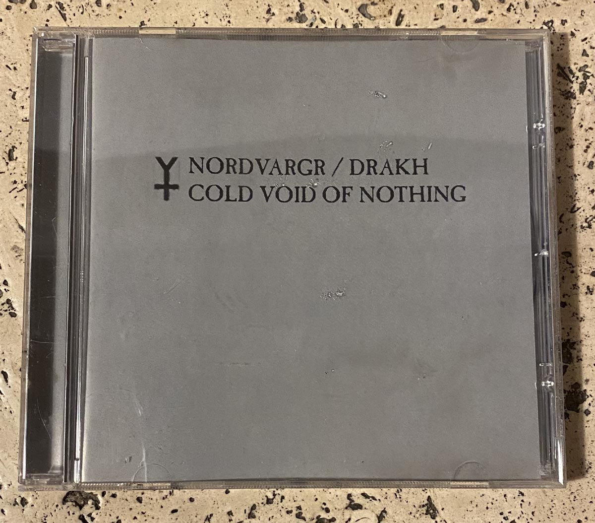 Nordvargr / Drakh - Cold Void Of Nothing | Fluttering Dragon Records