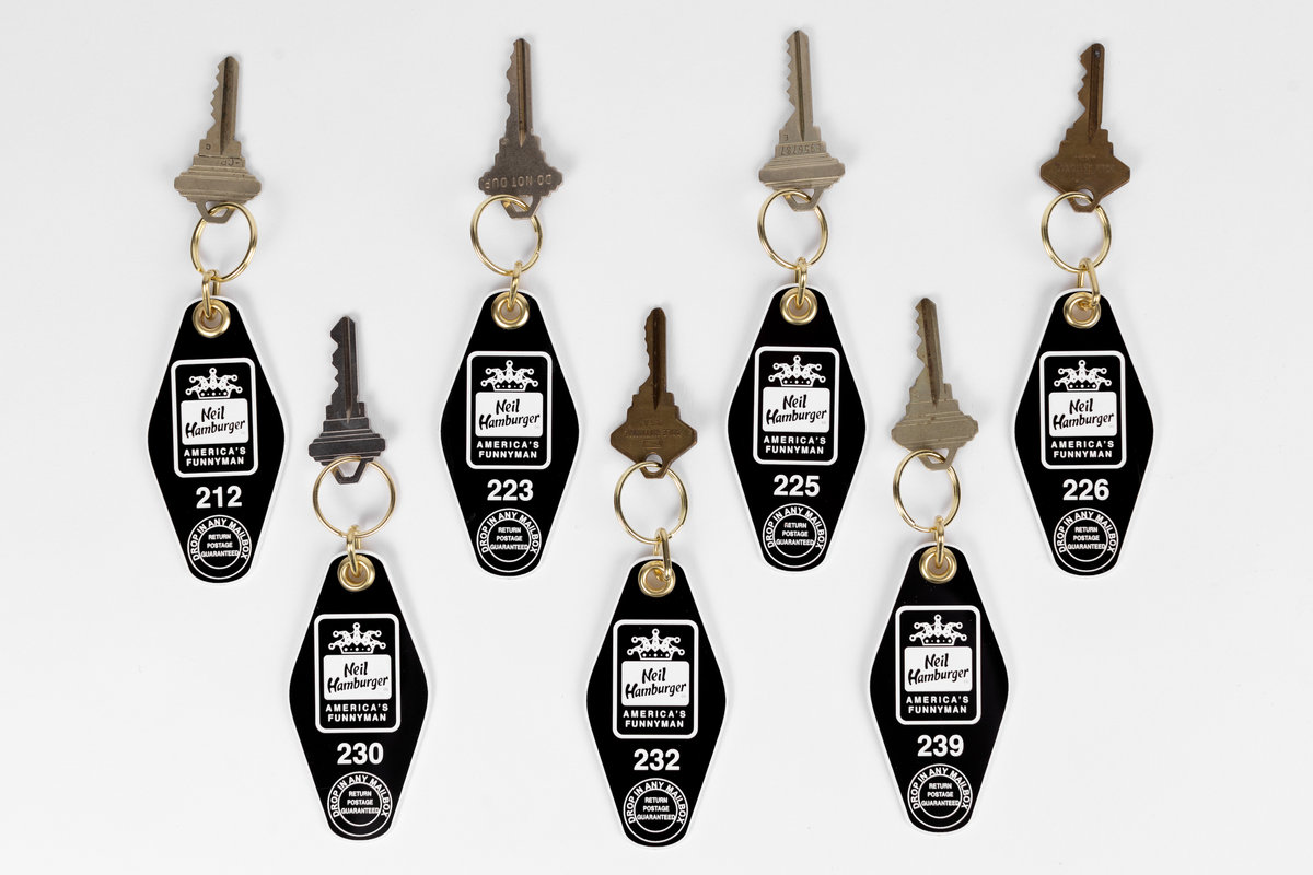 Neil Hamburger Keychain | Tolivar Souvenirs