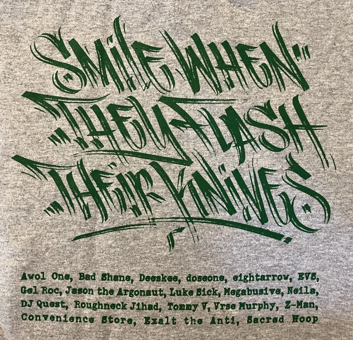 Super limited edition "Smile When They Flash Their Knives" t-shirt! | ATAK
