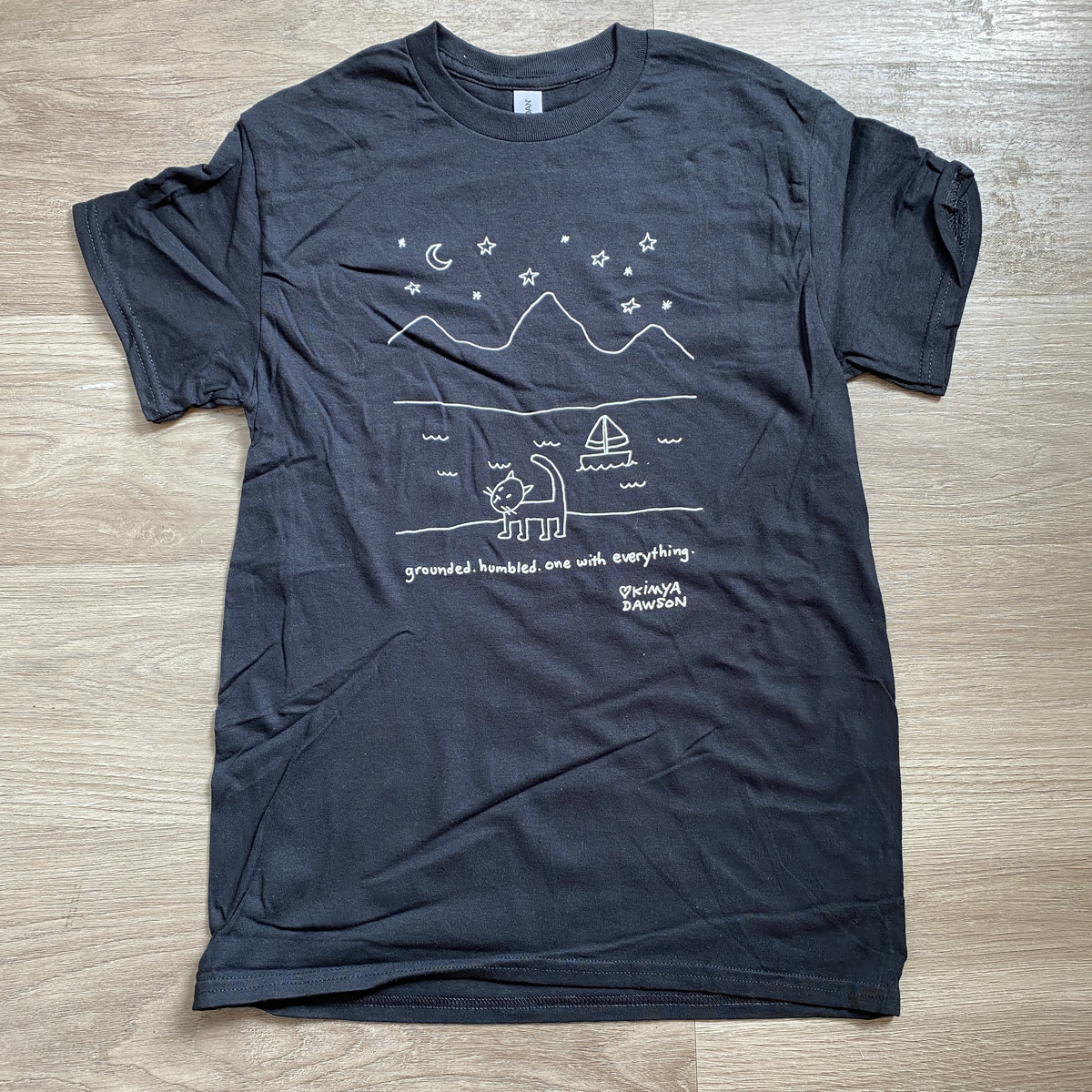 "grounded. humbled. one with everything" KIDS Black T-shirt | Kimya Dawson