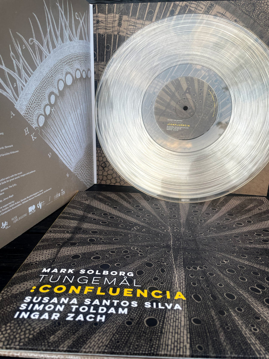 TUNGEMÅL :Confluencia | Mark Solborg