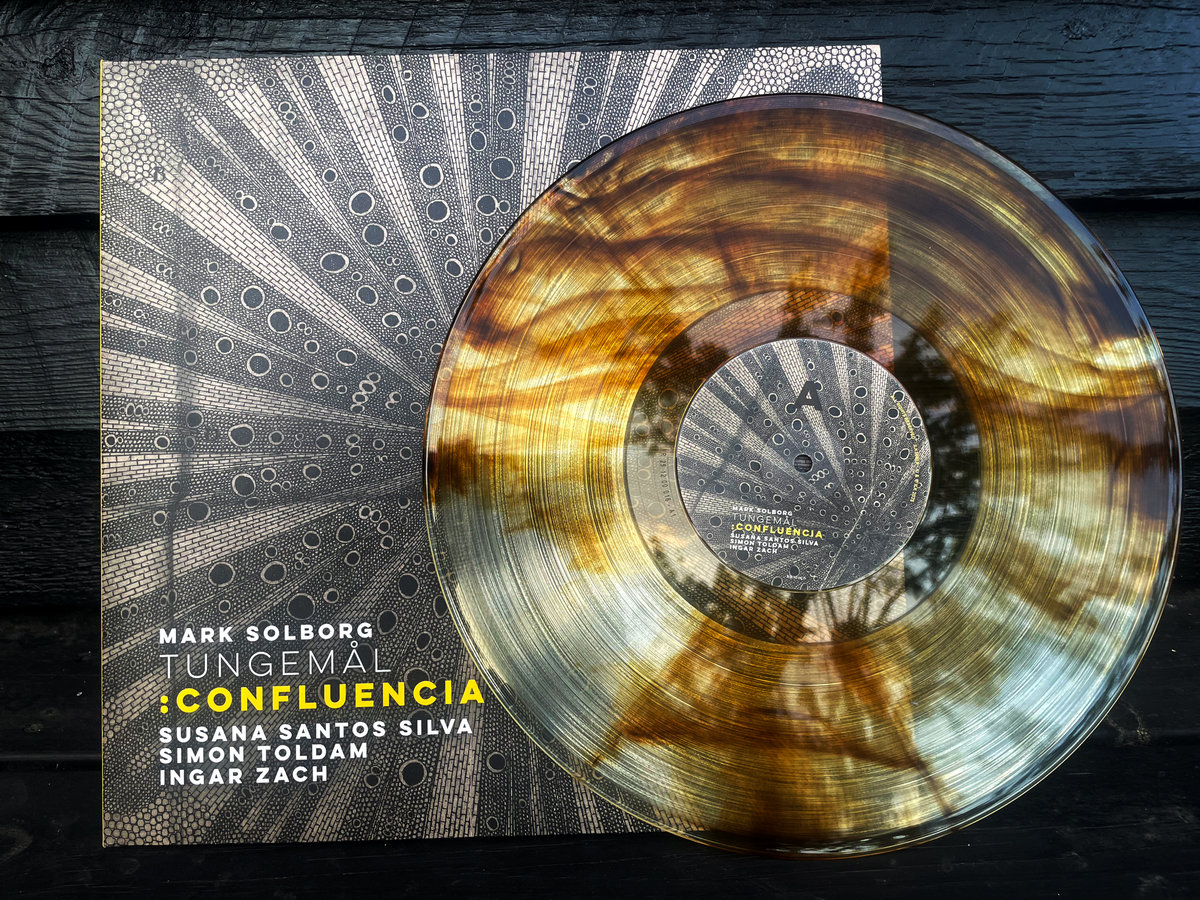 TUNGEMÅL :Confluencia | Mark Solborg