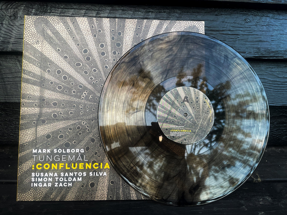 TUNGEMÅL :Confluencia | Mark Solborg