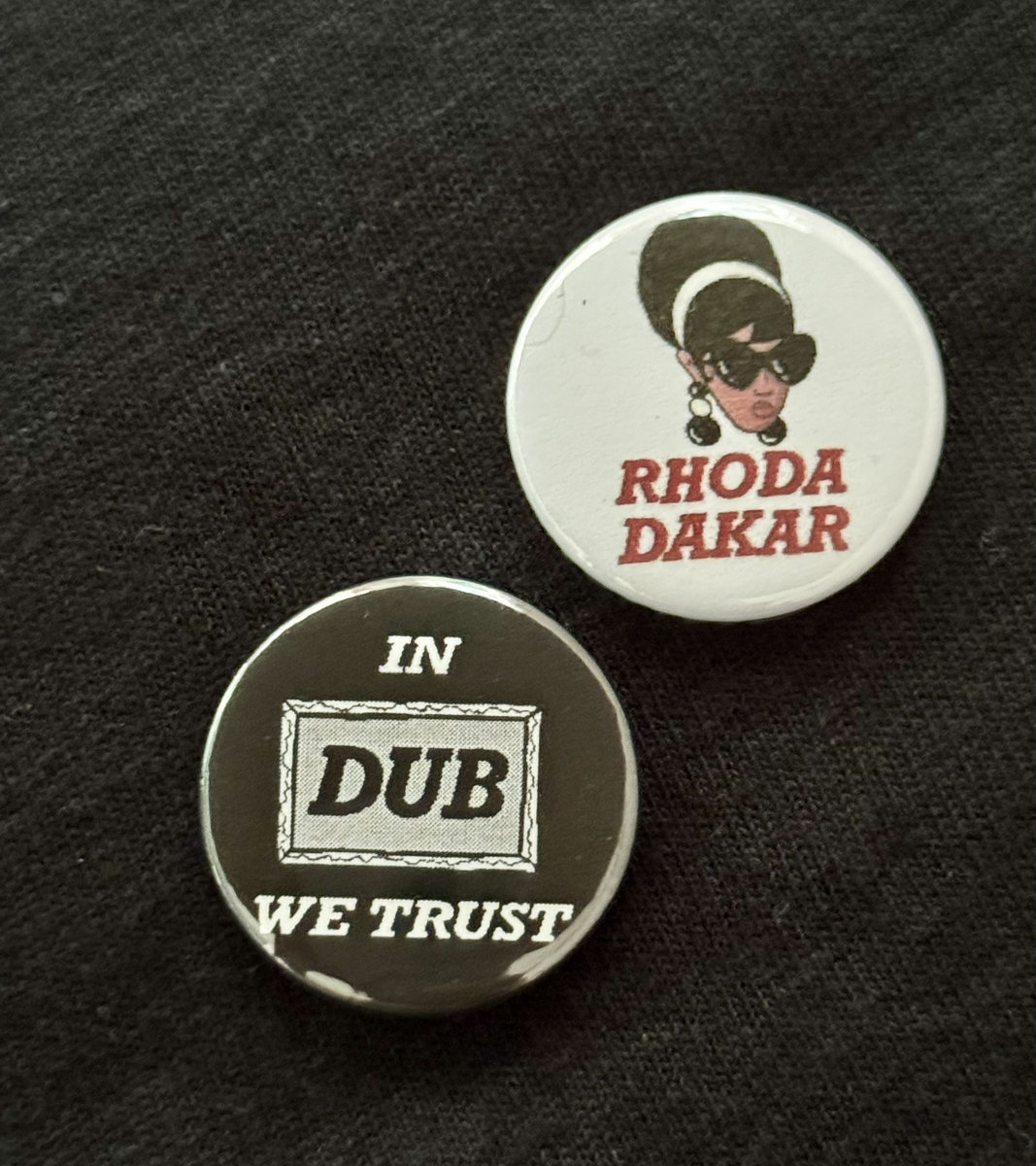 NEW! In Dub We Trust and Rhoda Dakar logo 1" metal badge set | Rhoda Dakar