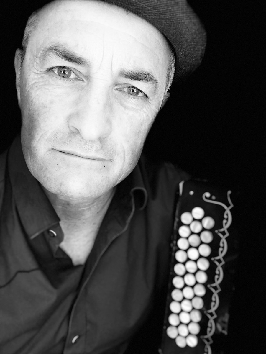 The Accordion Player | Paul Gunning