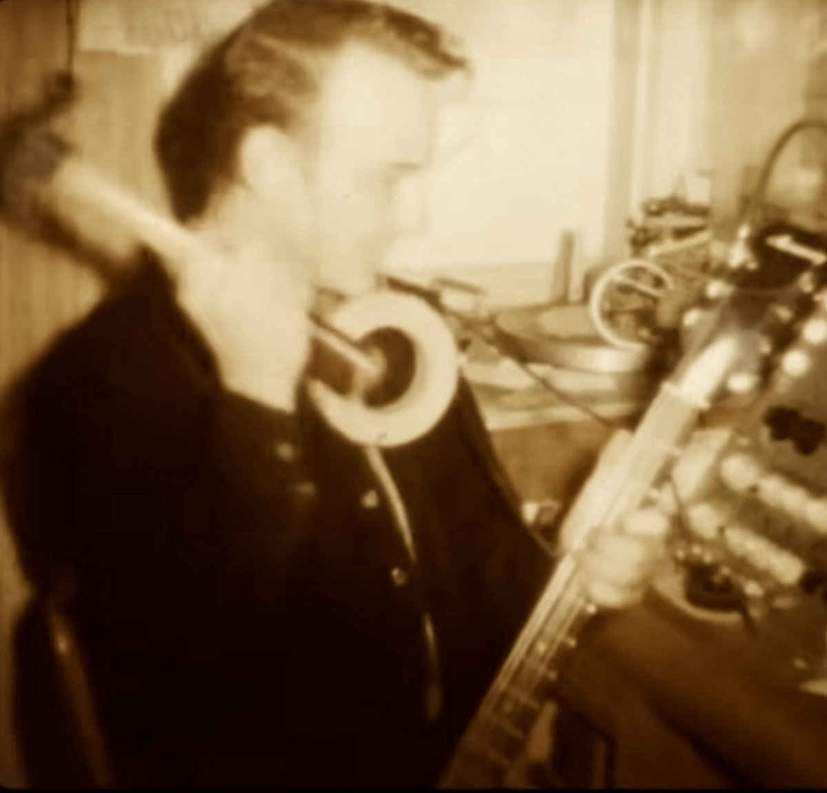 Using Guitars Like Hammers to Attach Big Planks Together | Dour Cream