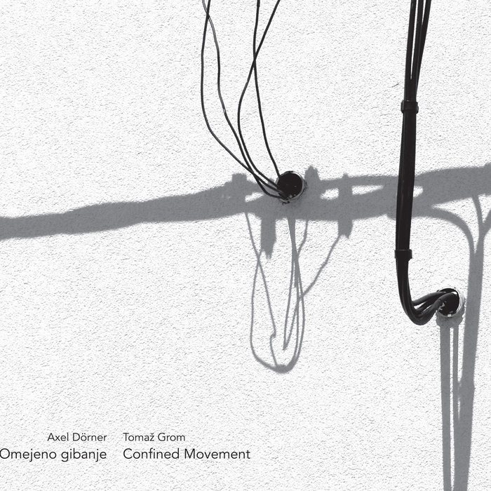 Omejeno gibanje / Confined Movement | Axel Dörner and Tomaž Grom | Sploh