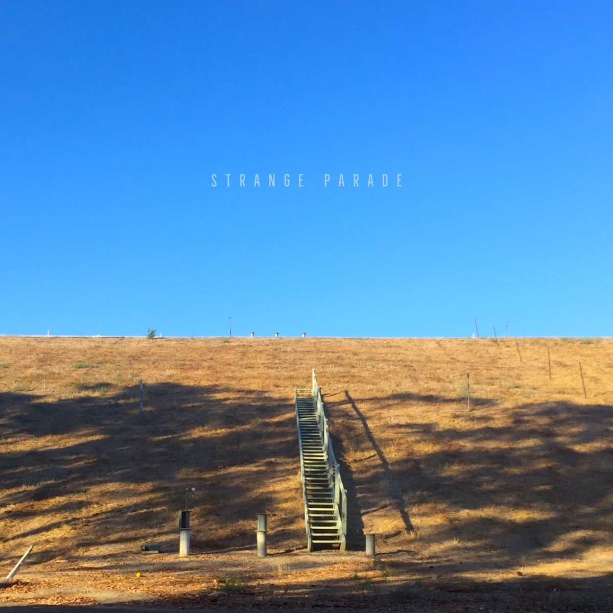 Between Us All | Strange Parade