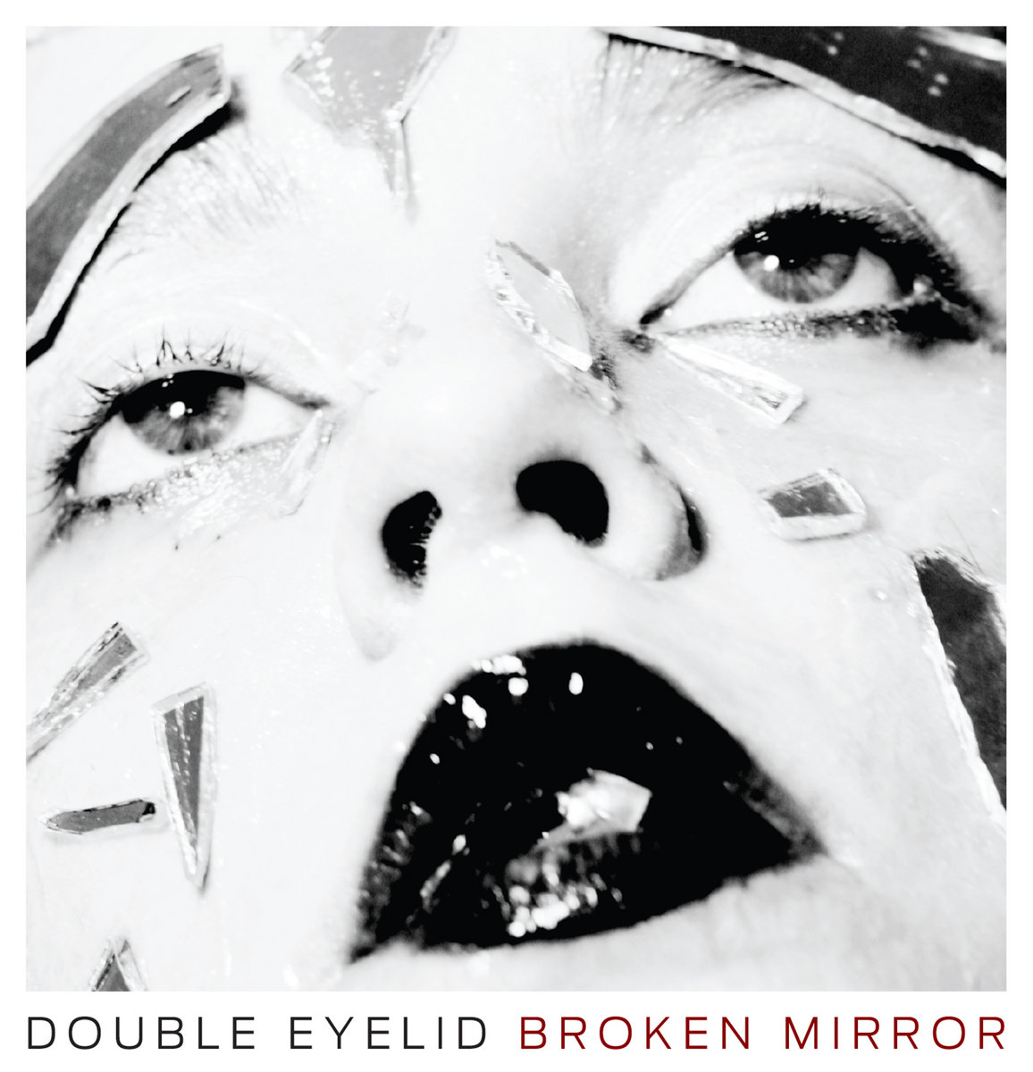 Face In Cracked Mirror