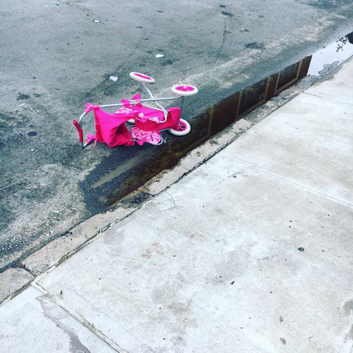 Baby On Cement | The Living Strange