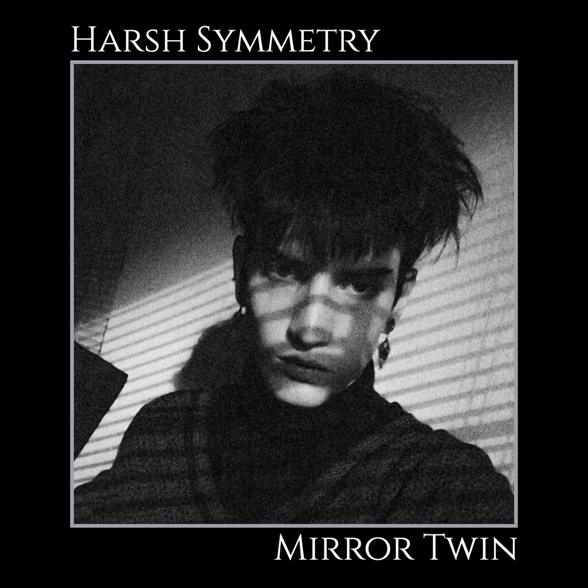 Mirror Twin | Harsh Symmetry