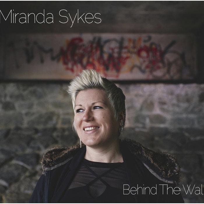 Behind The Wall | Miranda Sykes