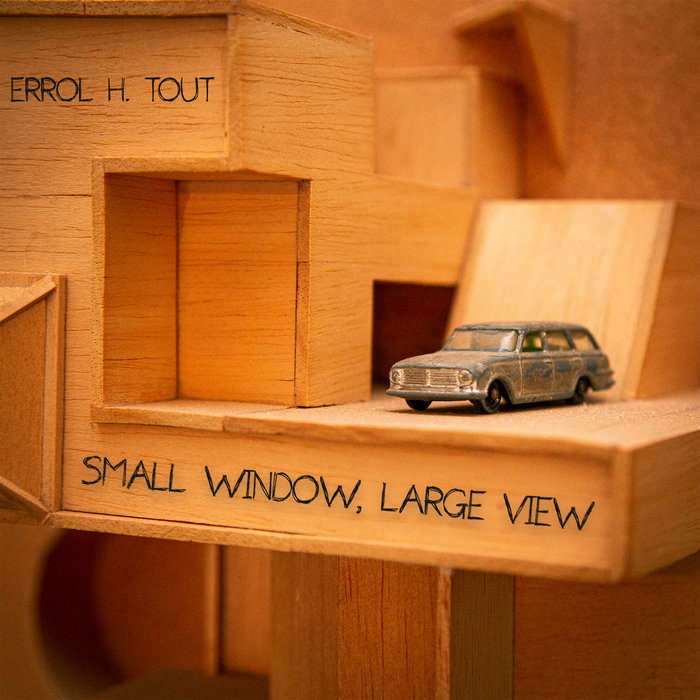 Small Window, Large View | Errol H. Tout