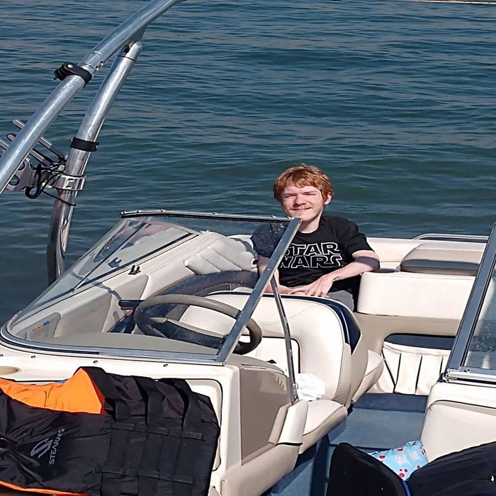 disabled man on a boat | adianrossmarlar | adian marlar