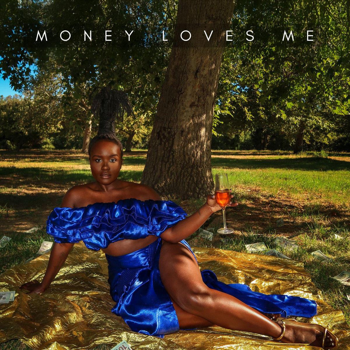 MONEY LOVES ME | Tamika J.