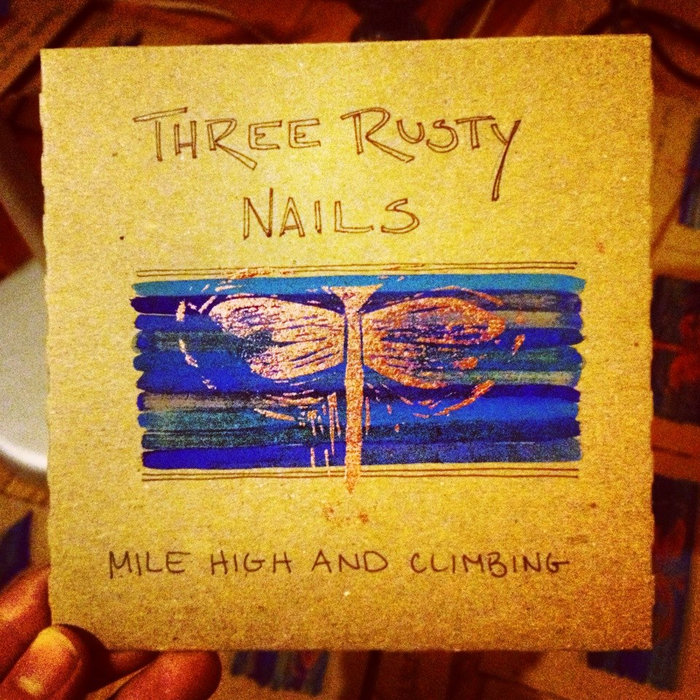 Mile High and Climbing | Three Rusty Nails