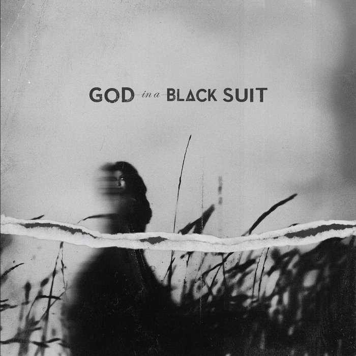 God in a Black Suit | God in a Black Suit